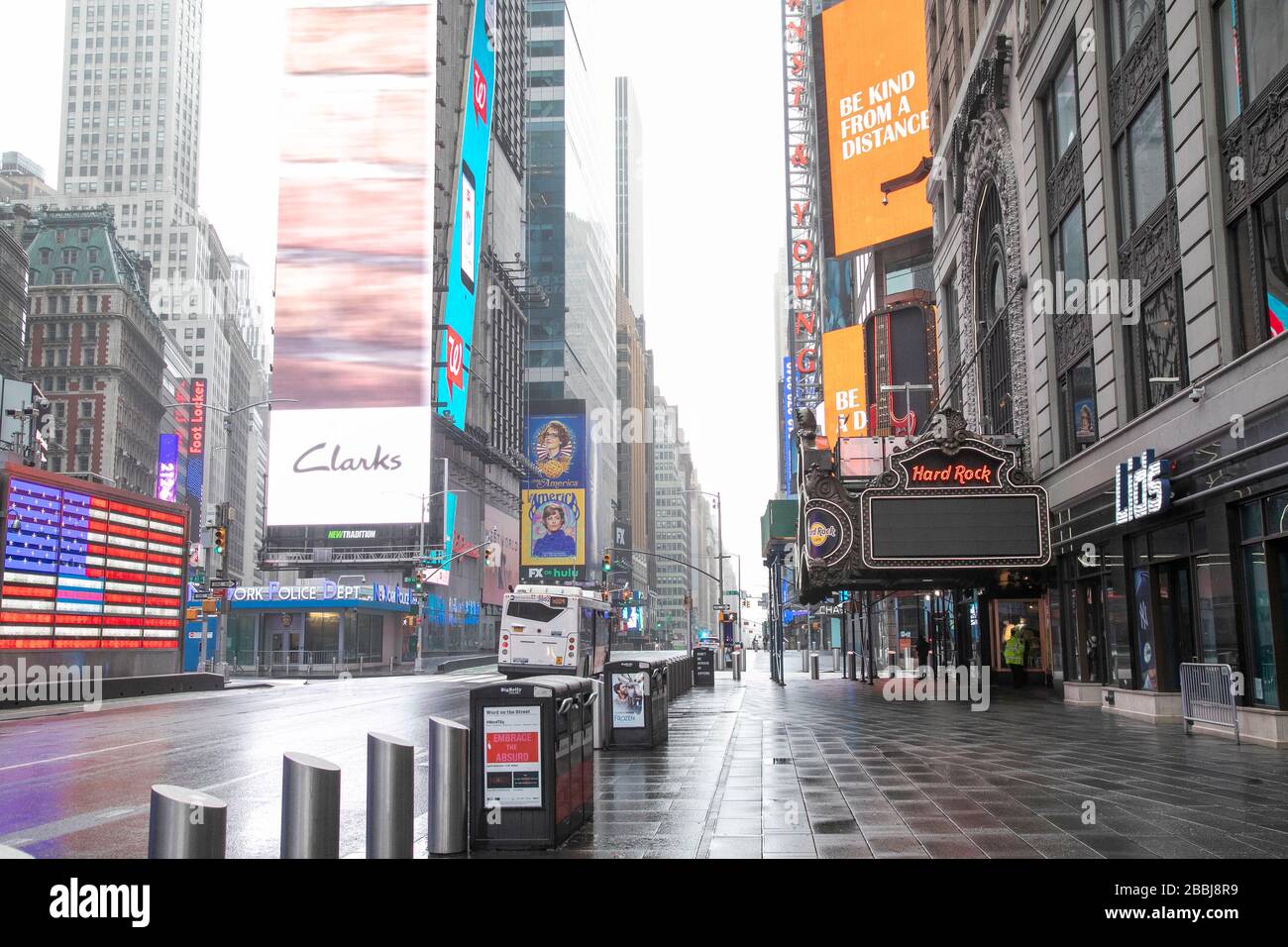 A quiet rainy day in Times Square during the coronavirus pandemic Stock ...
