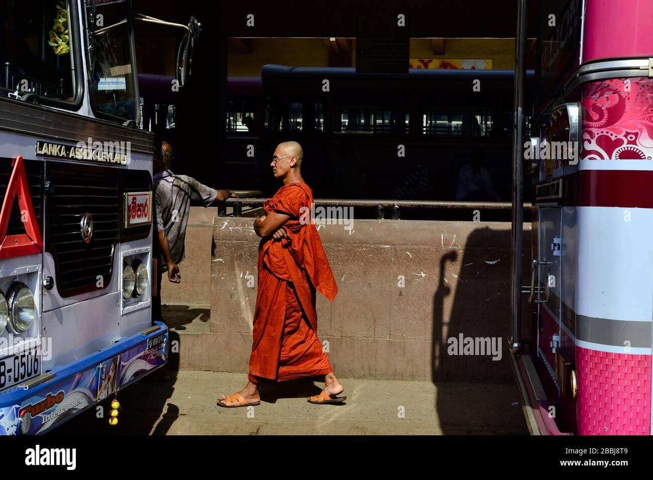 Matara, Sri Lanka: March, 2017: Buddhist monk in orange robes ...