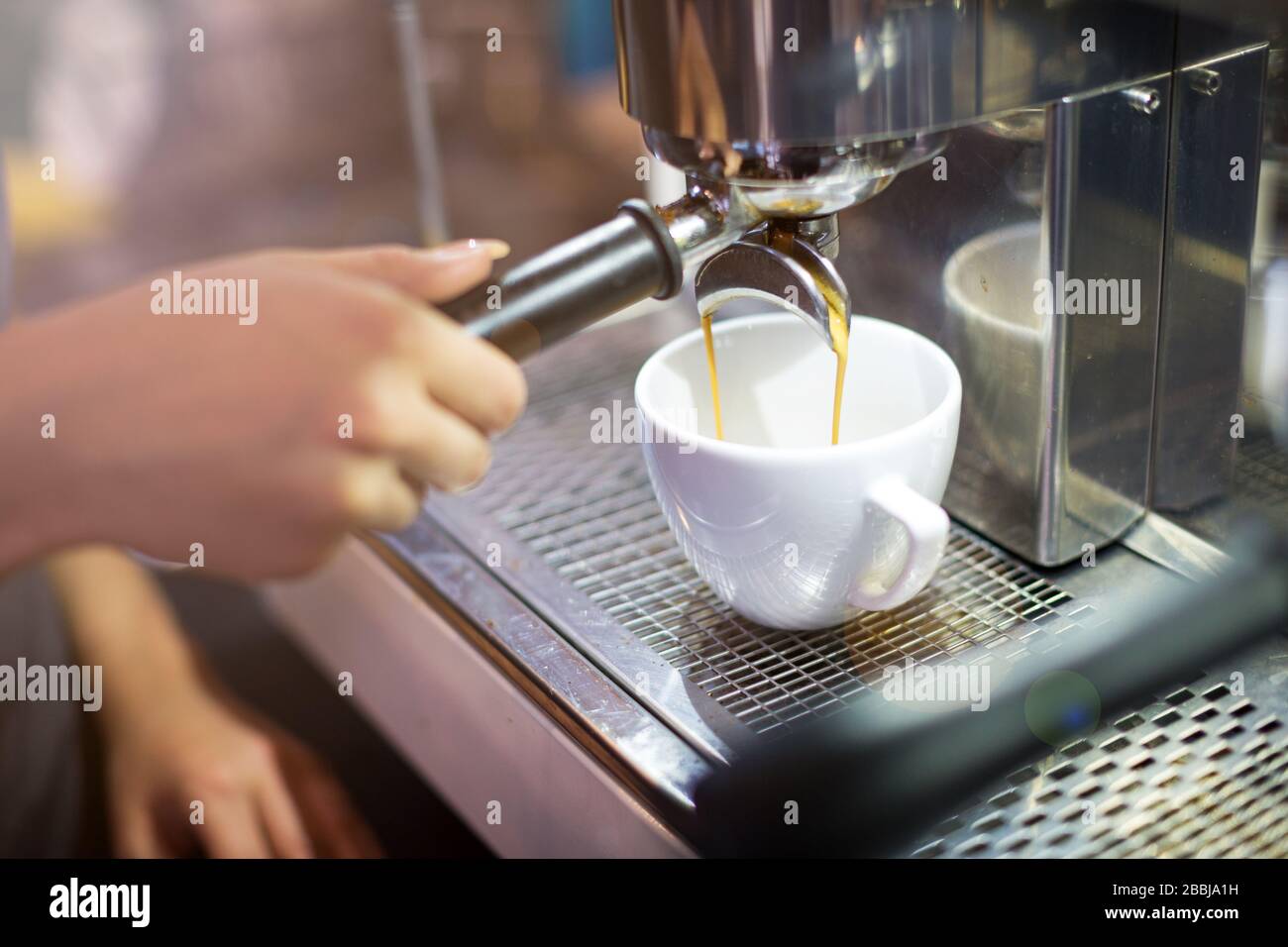 Making coffee Stock Photo - Alamy