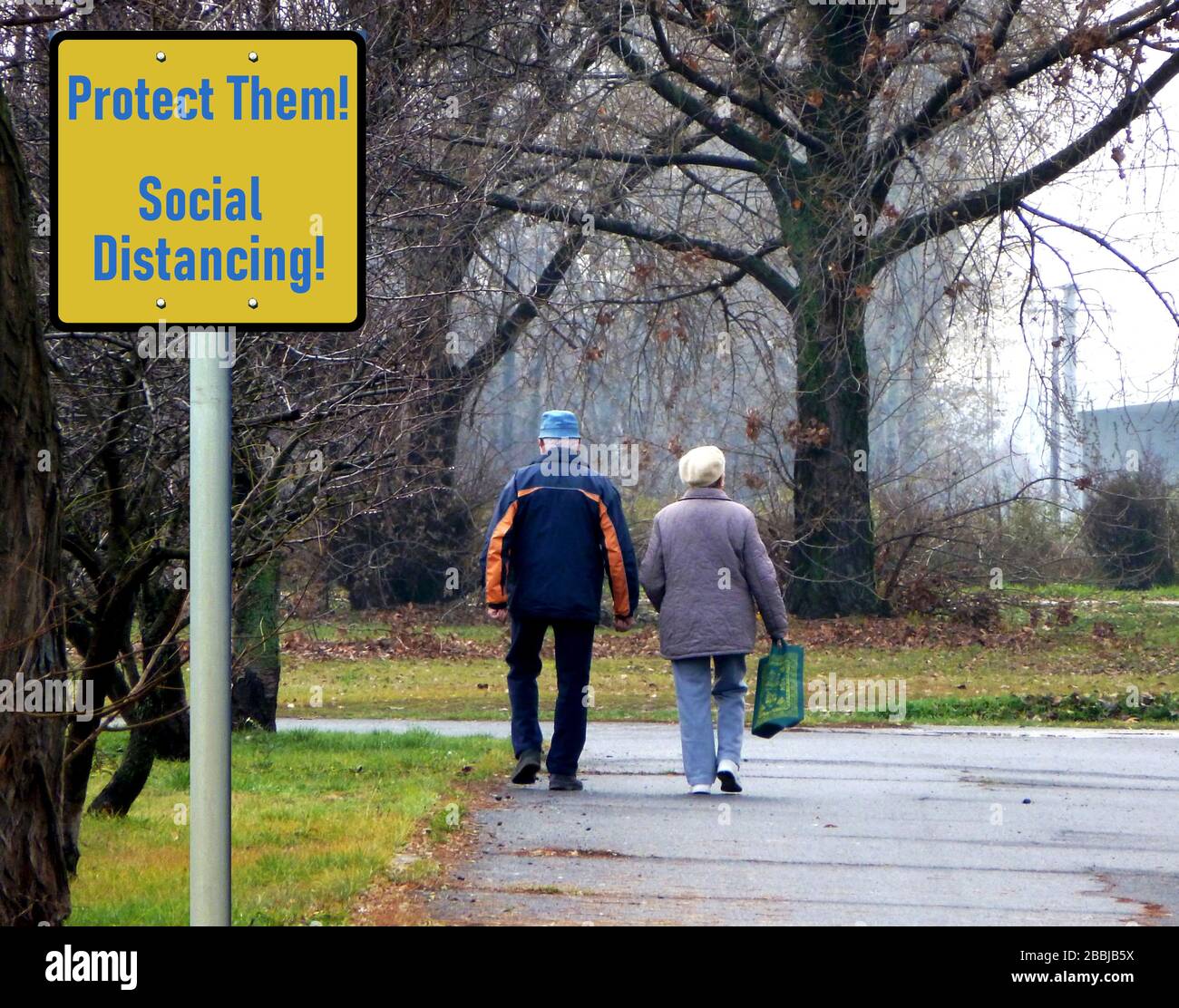 Social Distancing. Yellow road sign. COVID-19 label. Infectious virus ...