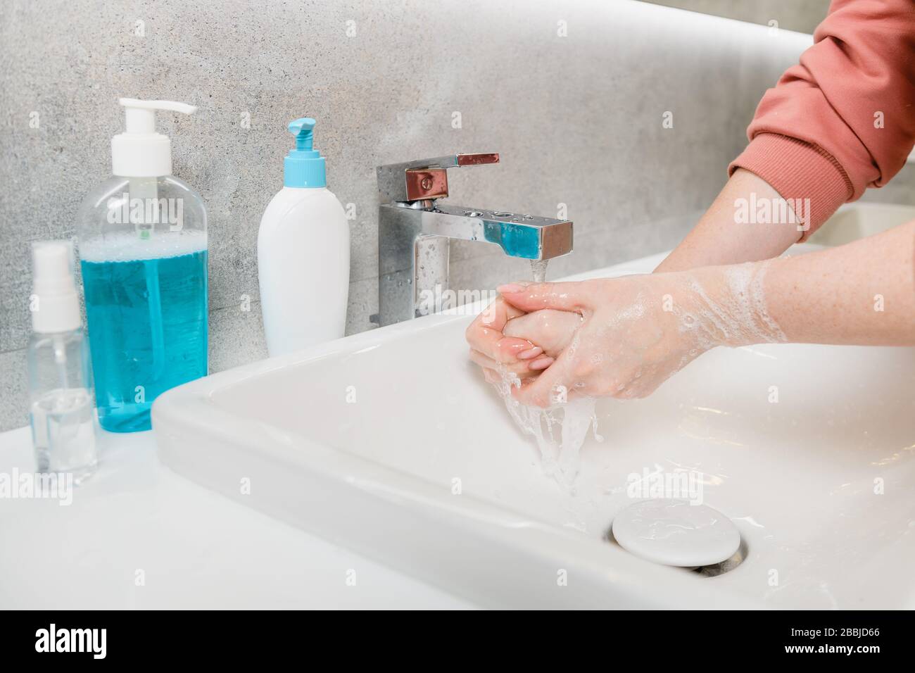 Washing arms with soap hi-res stock photography and images - Alamy