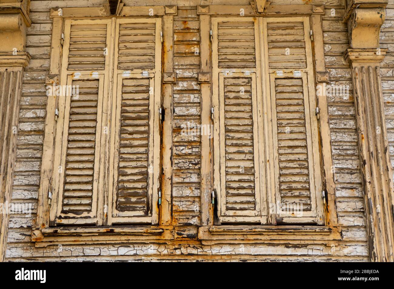 Old wooden yellow windows. Old traditional Turkish house Stock Photo ...