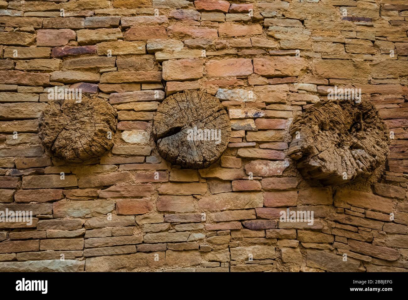 Masonry walls of buildings, consisting of sandstone and mud mortar with ...