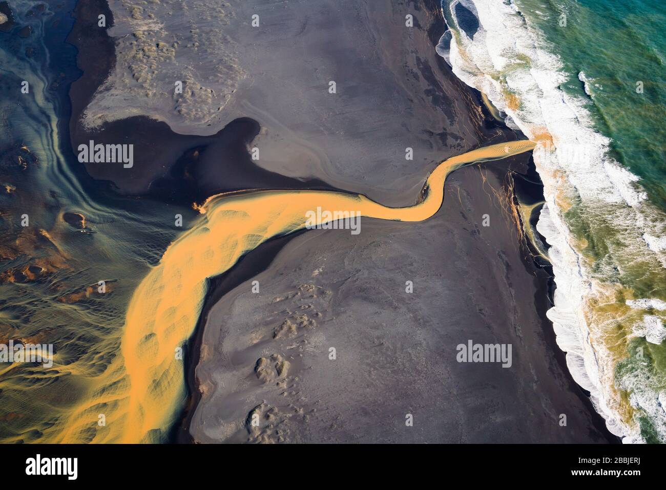 Aerial view of braided orange river flowing into ocean in southe Stock Photo - Alamy