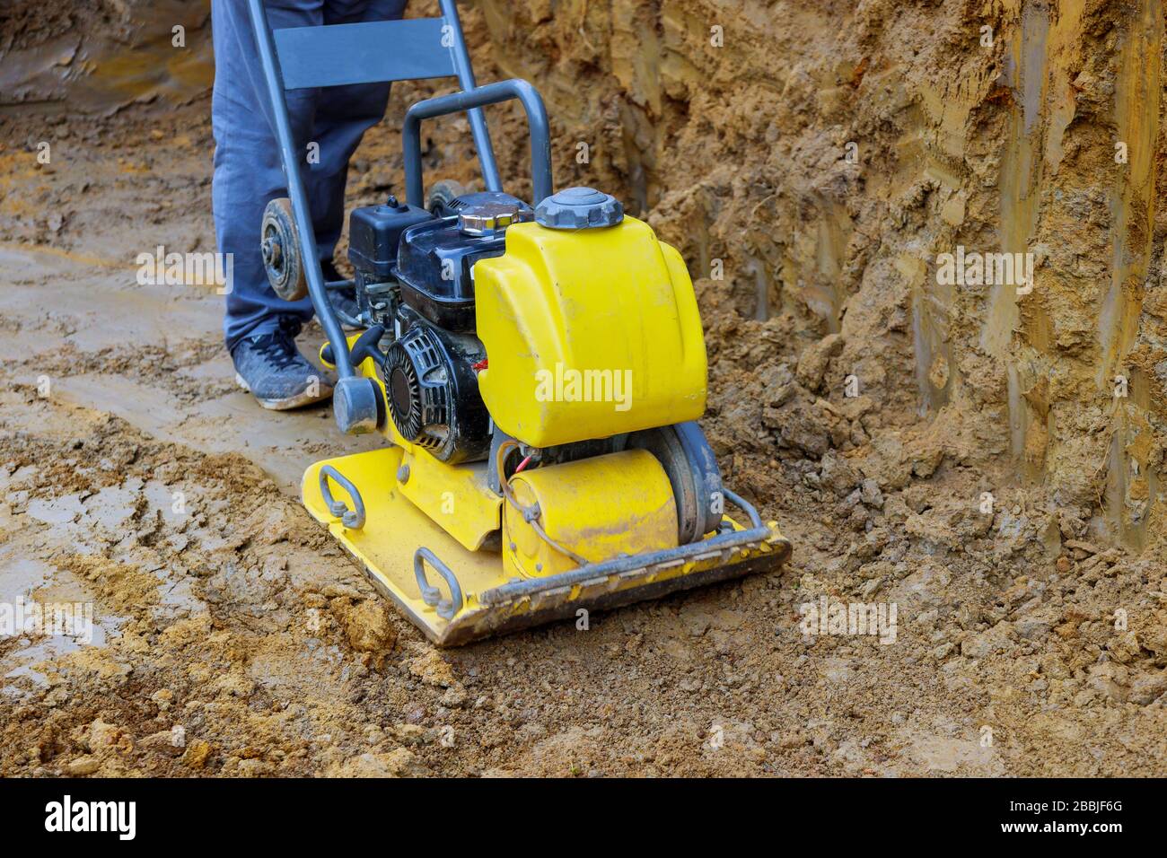 Vibratory plate compactor in construction rammer ground compaction of ...