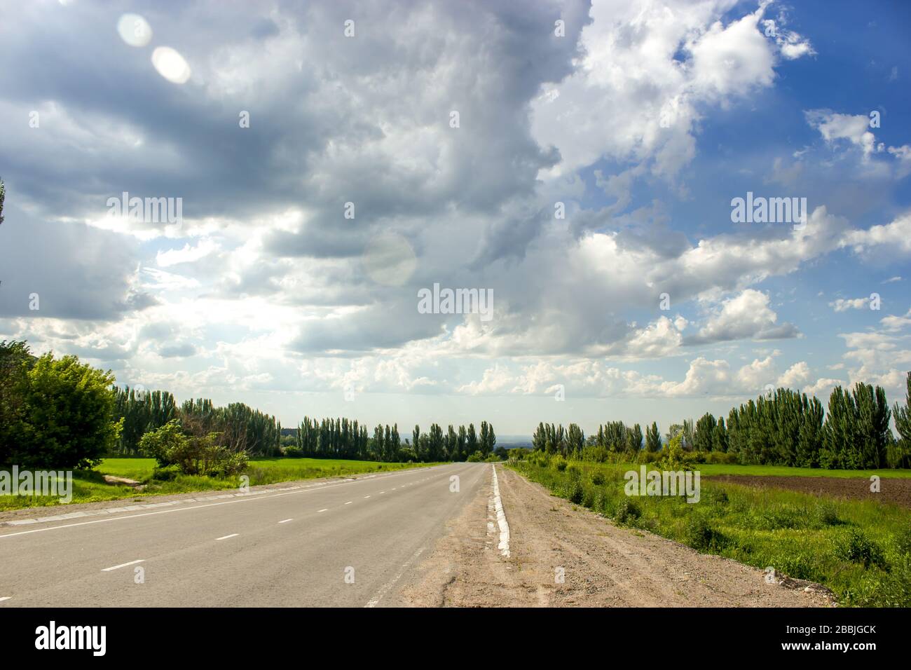 Beautiful summer landscape with clouds in blue sky in the countryside ...
