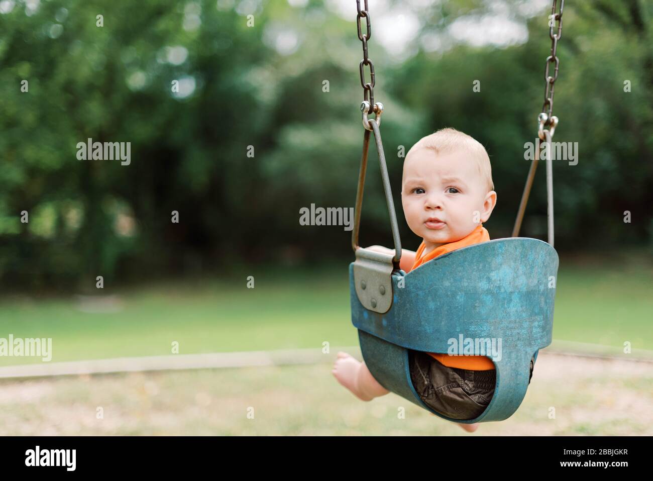 Month old baby swinging in hi-res stock photography and images - Alamy