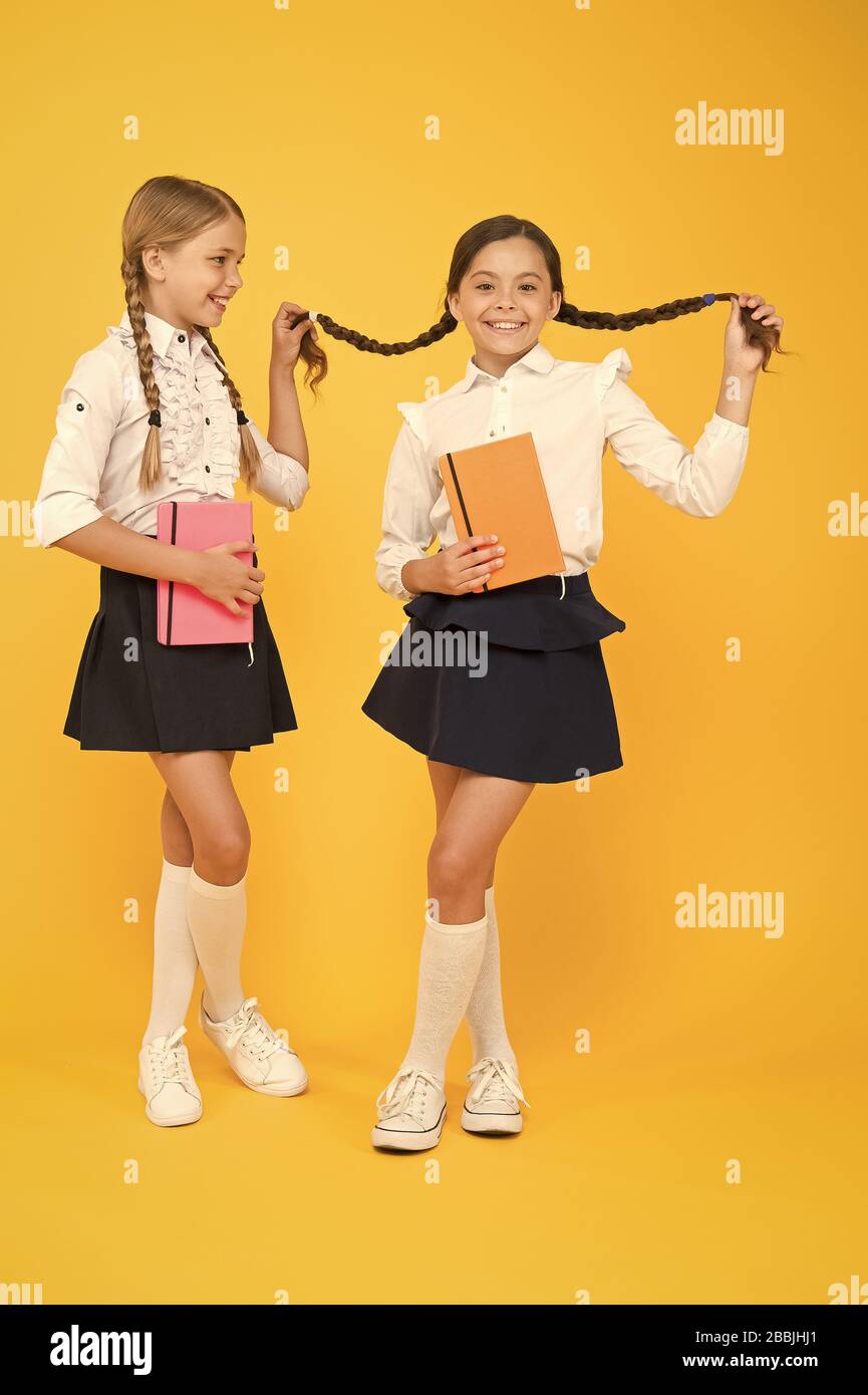 happy girls study with workbook. reading and writing. small girls kids ...