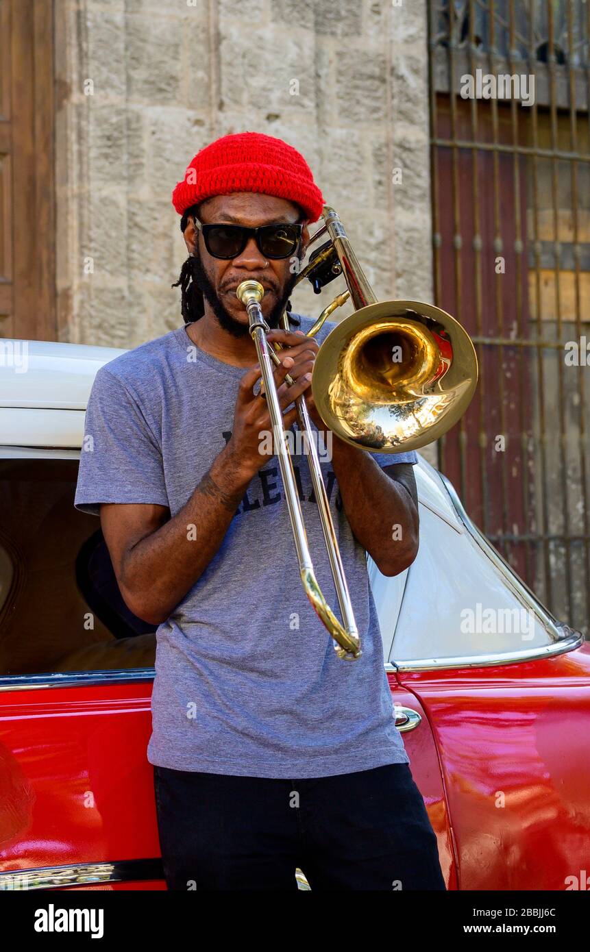 Playing trombone hi-res stock photography and images - Alamy