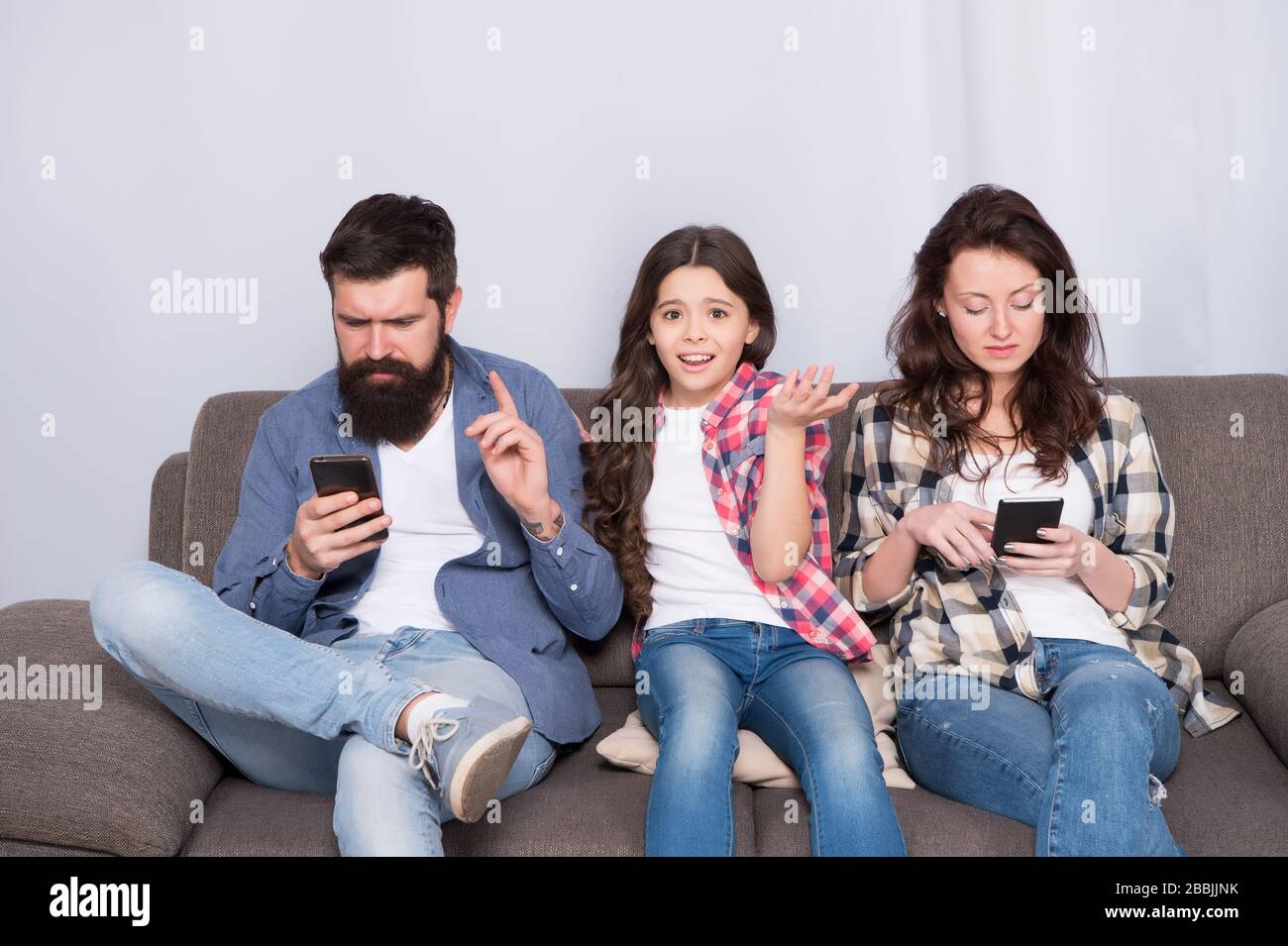 Family addicted to phones hi-res stock photography and images - Alamy