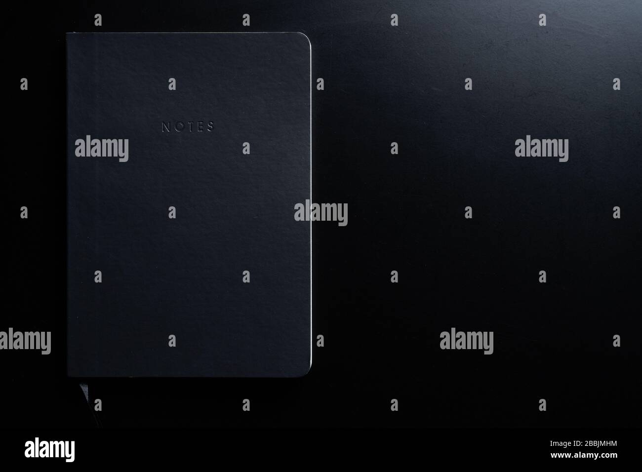 Black style set: notepad on Black background Stock Photo - Alamy