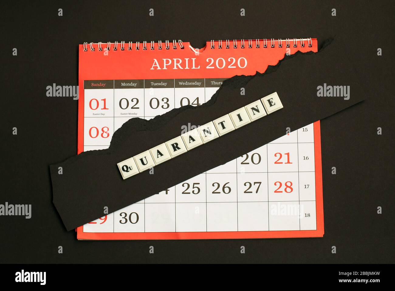 Calendar on the black wall with April notes on QUARANTINE Stock Photo ...