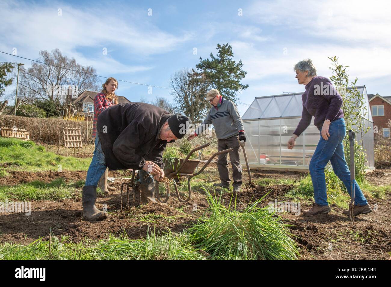 Working on a new allotment in order to grow their own food and stay ...