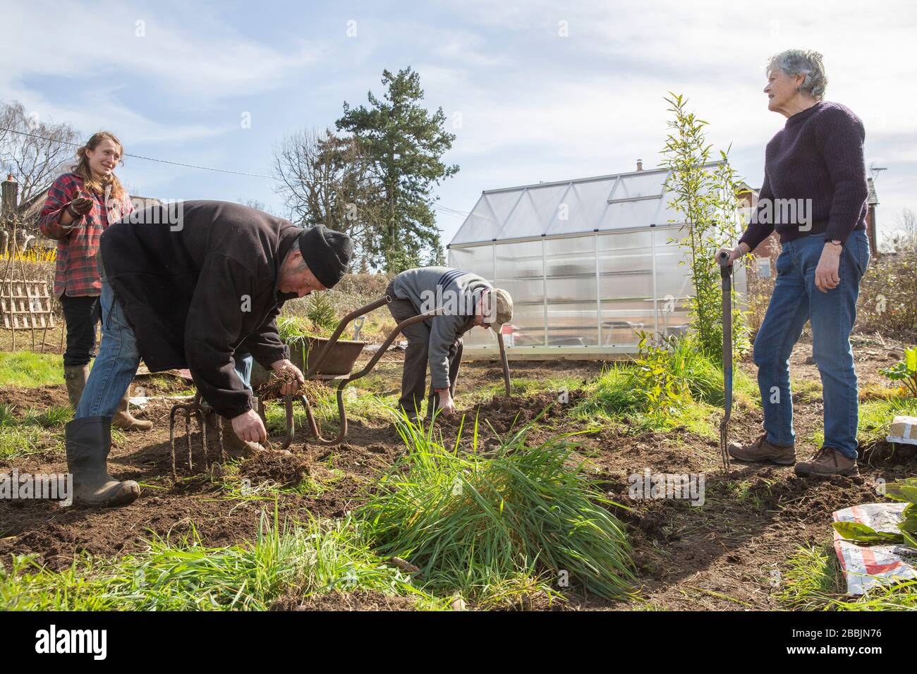 Working on a new allotment in order to grow their own food and stay ...
