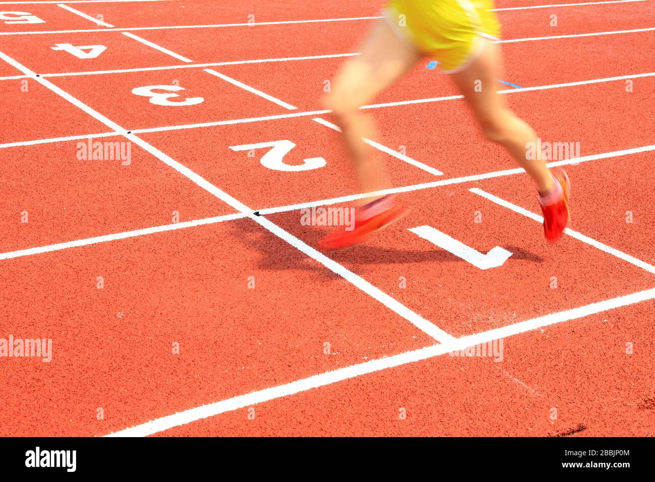 Athletes running in the playground, leg ministry close-up Stock Photo ...