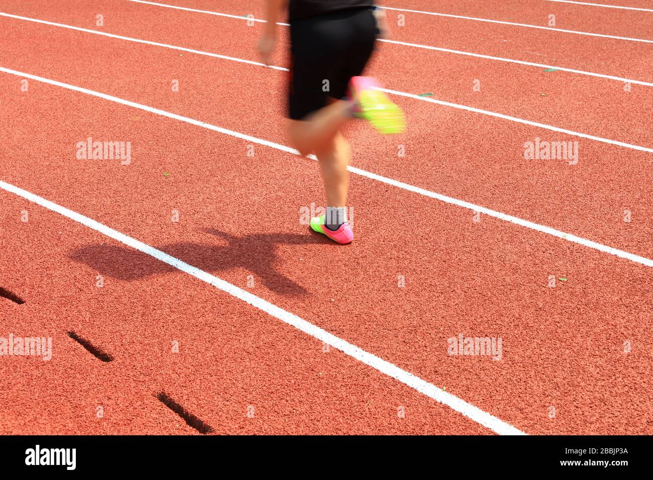 Athletes running in the playground, leg ministry close-up Stock Photo ...