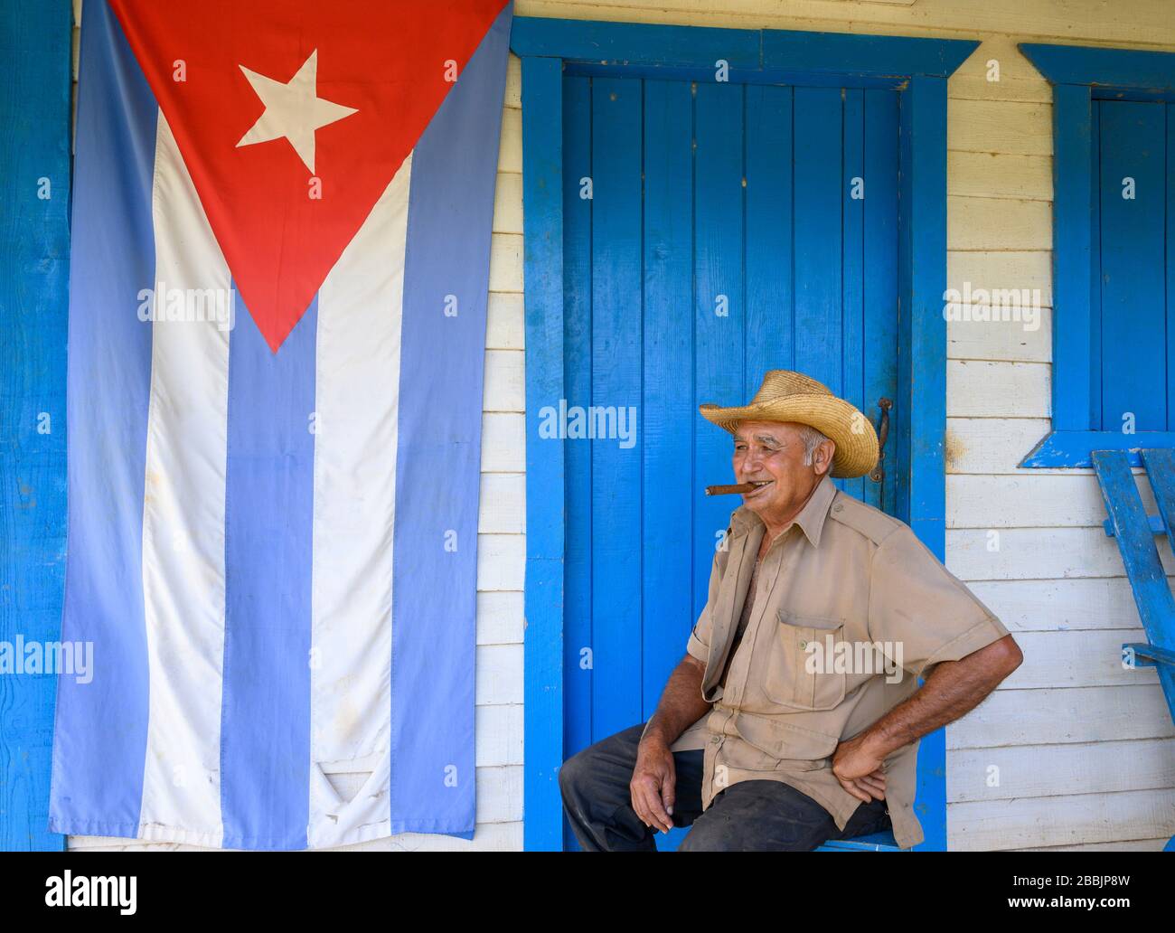 Farm workers with cuban flag, at organic farm, Vinales, Pinar del Rio ...