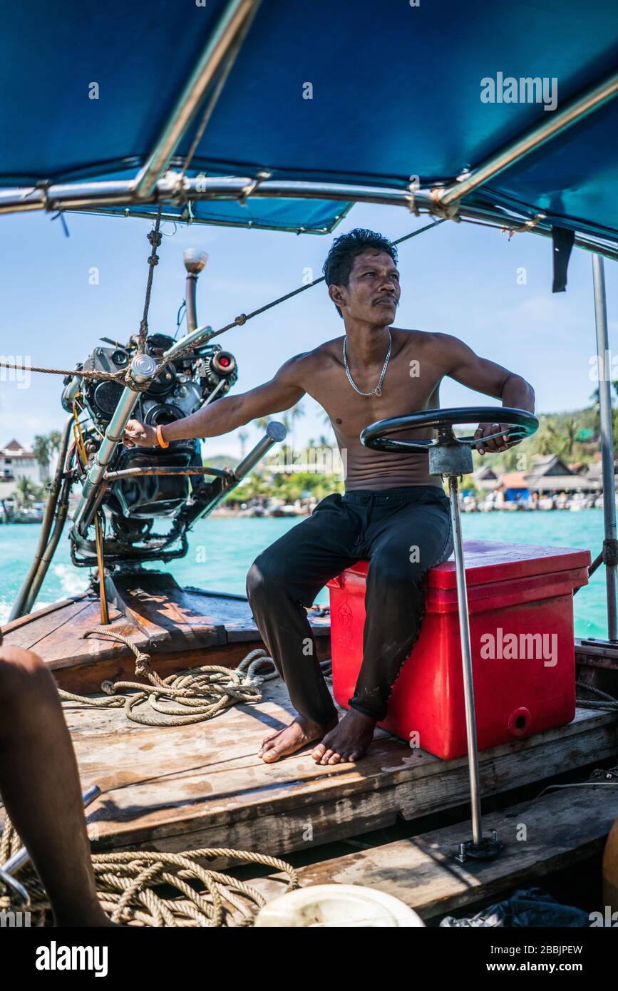 Thailand beach boat captain hi-res stock photography and images - Alamy