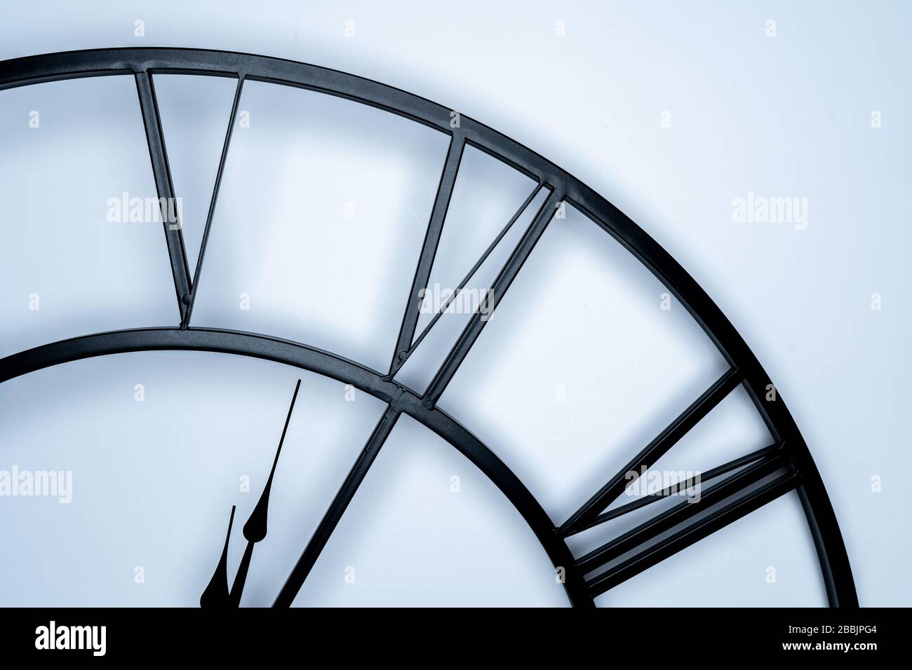 Simple style wall clock with woman number, On five Stock Photo - Alamy