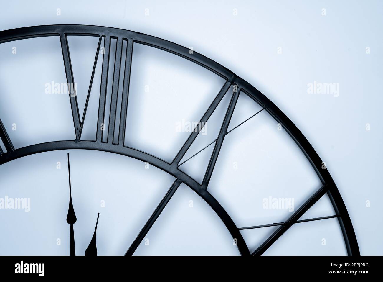 Simple style wall clock with woman number, On eight Stock Photo - Alamy