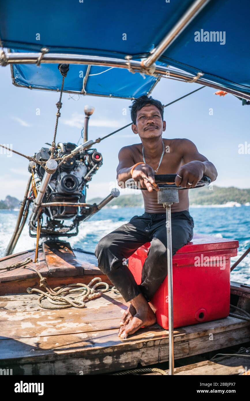 Thailand beach boat captain hi-res stock photography and images - Alamy