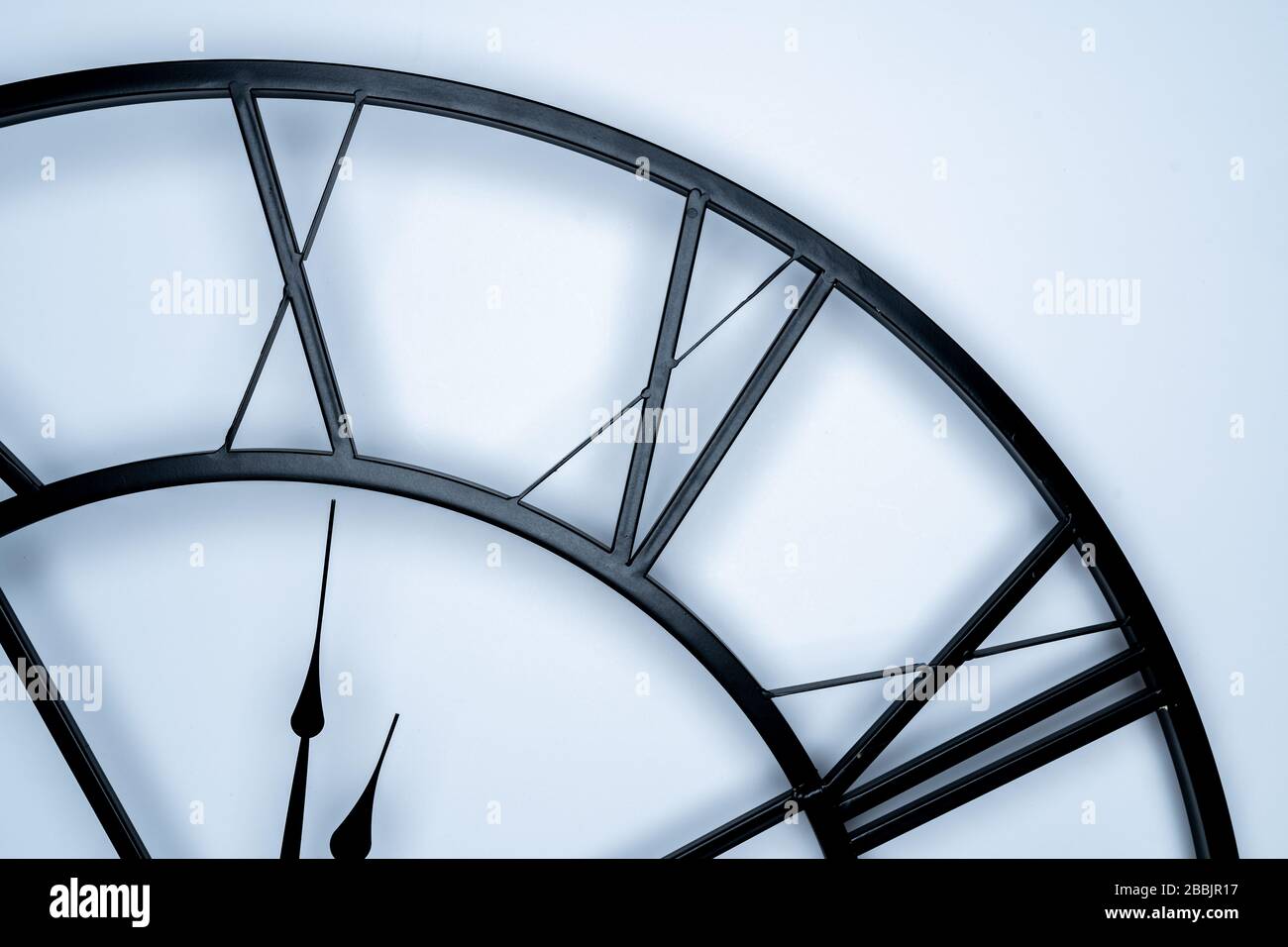 Simple style wall clock with woman number, On ten Stock Photo - Alamy