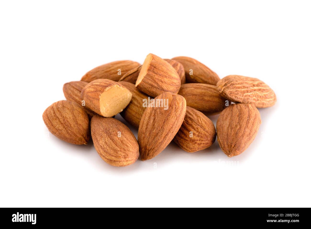 closeup peeled almonds isolated over white background Stock Photo - Alamy