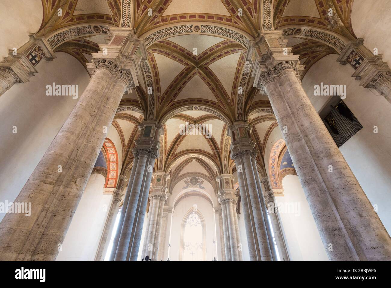 Beautiful Italian church Looking up at painted and decorated curves and ...