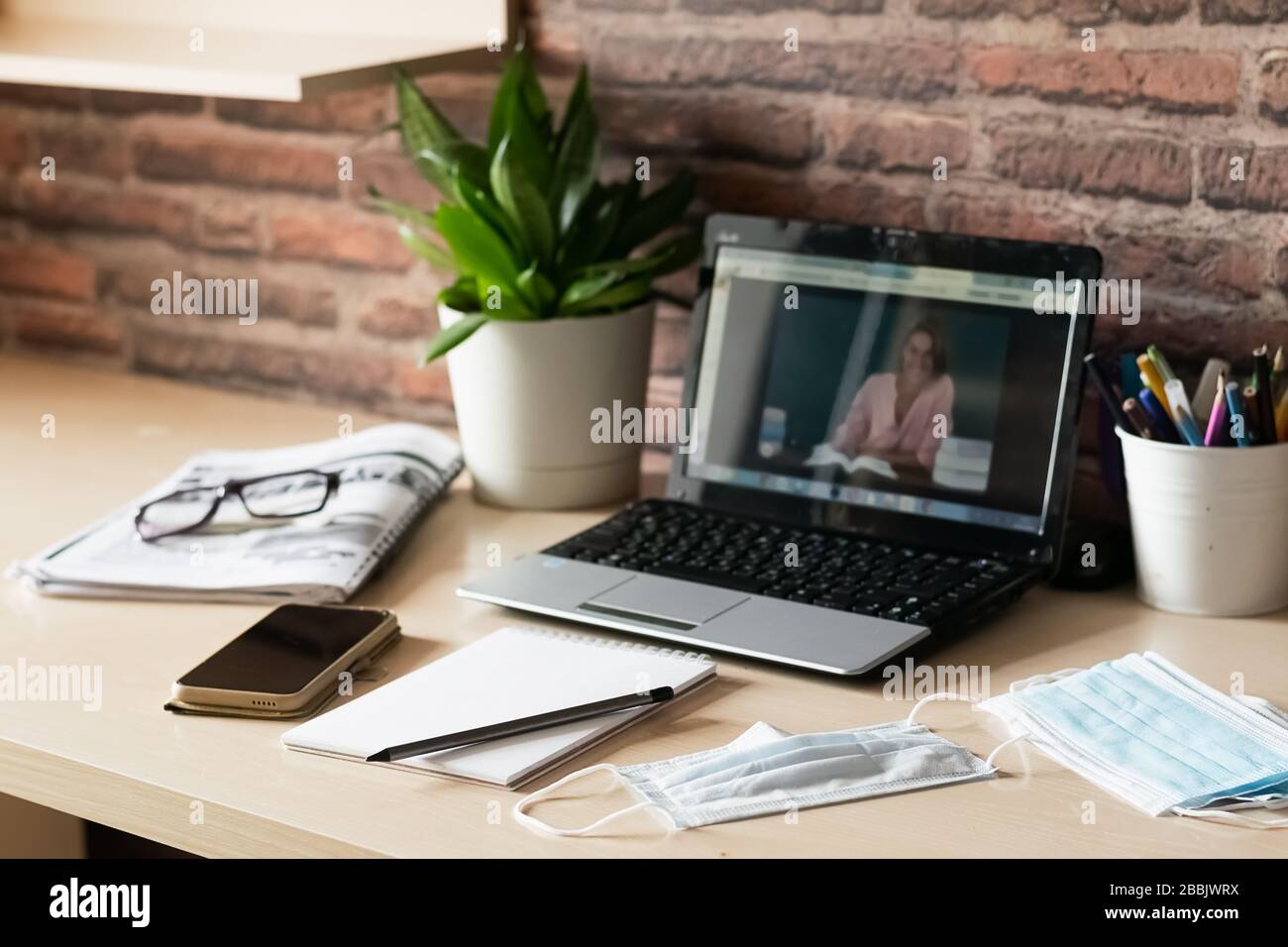 The concept remote online learning work self-isolation. Workplace ...