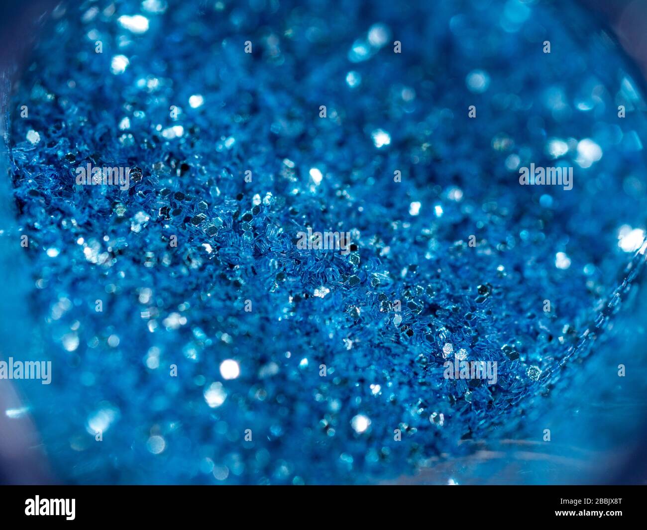 Macro shot of some blue glitter for decorations Stock Photo - Alamy