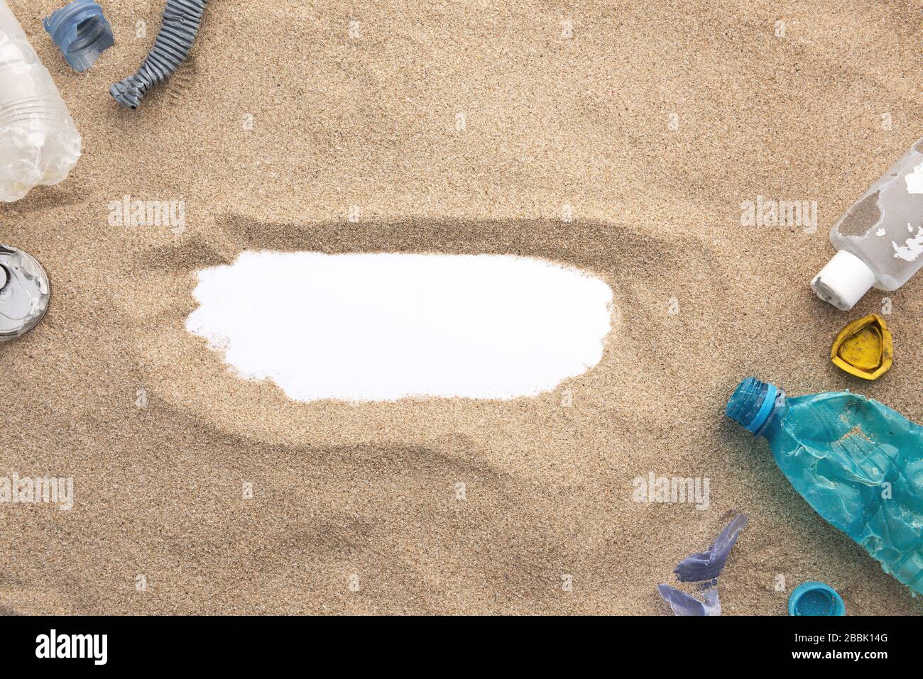 Garbage collected on sand with copy space. Top view Stock Photo - Alamy