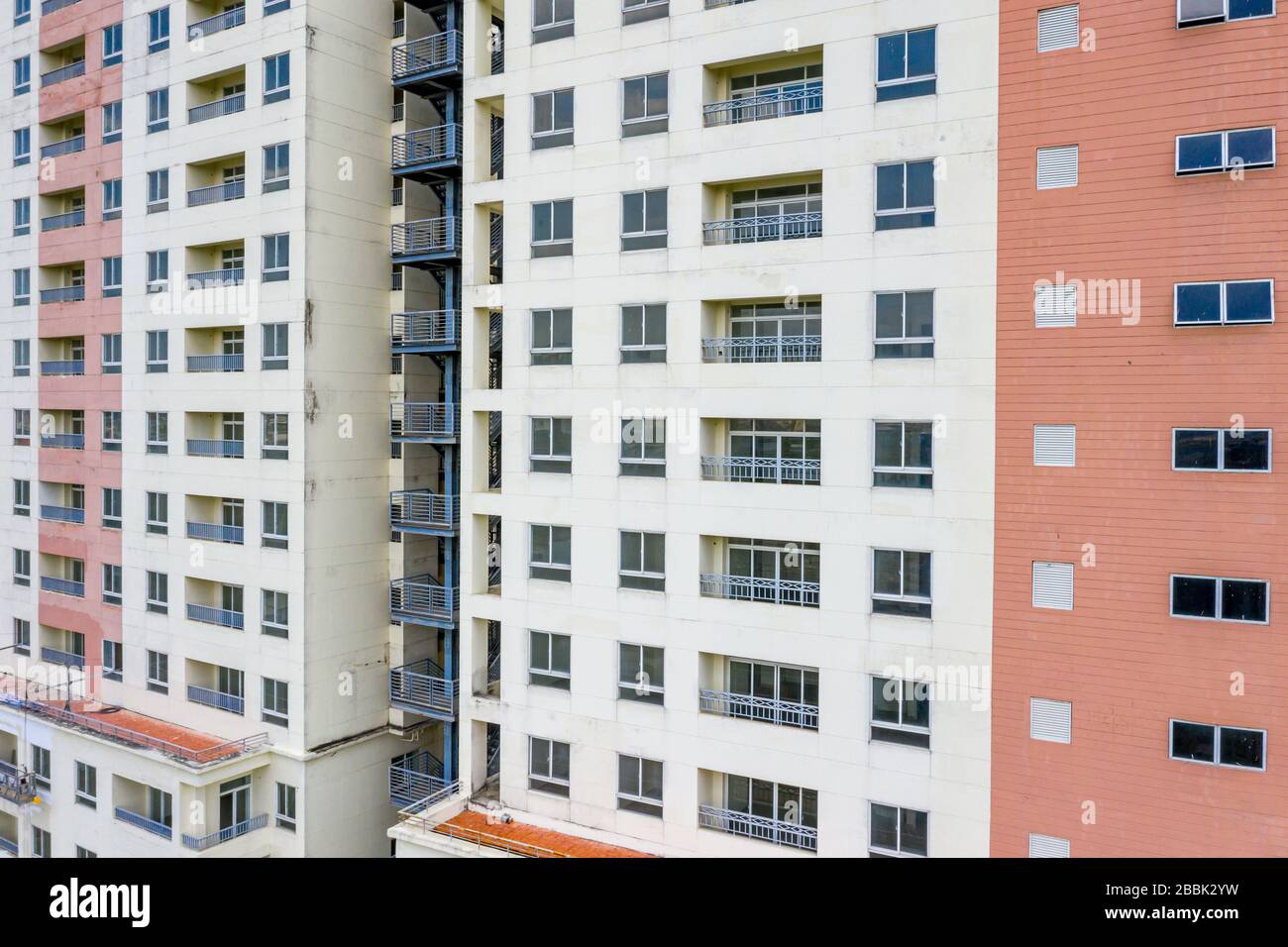 Facade of apartment building with windows and balconies Stock Photo - Alamy