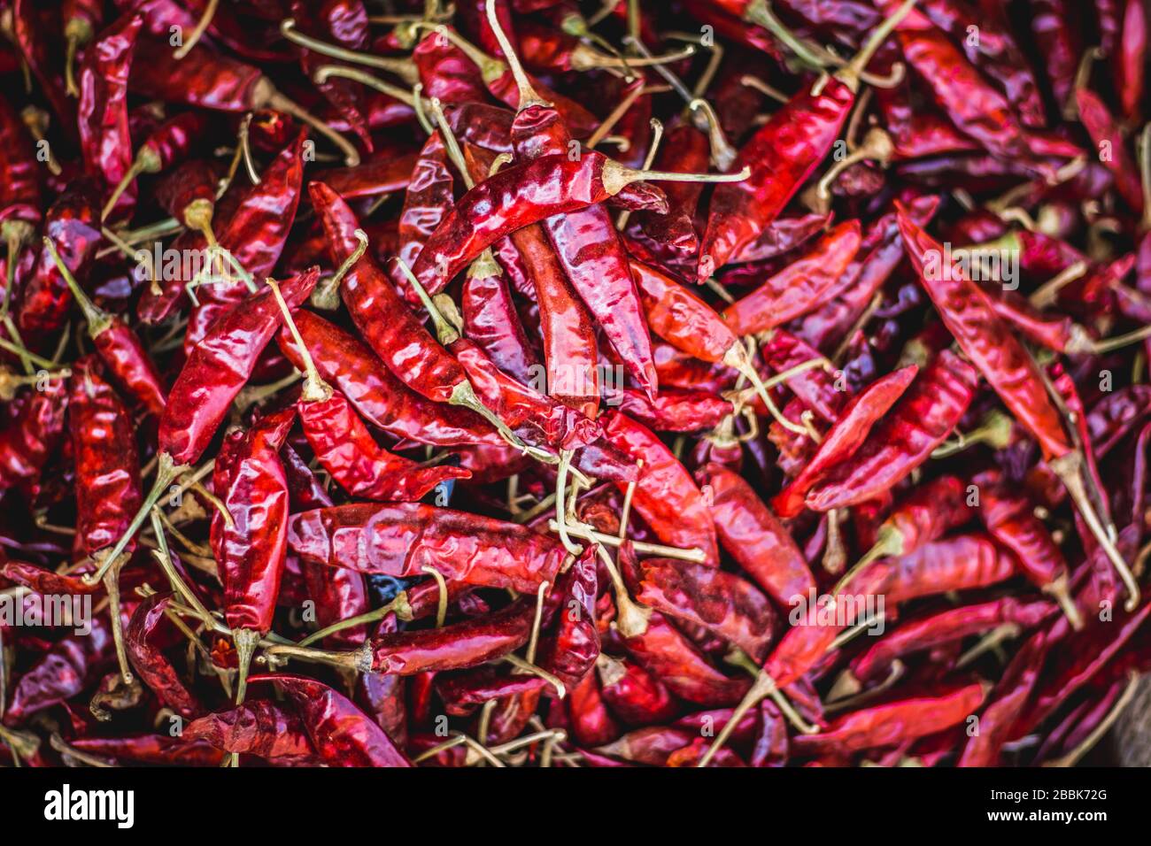 Dried red chilli peppers.Top view Close up shot of spicy red chilli on ...