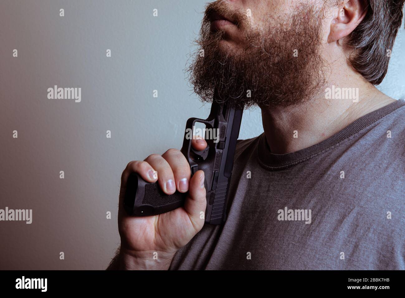 Person holding gun to head hi-res stock photography and images - Alamy