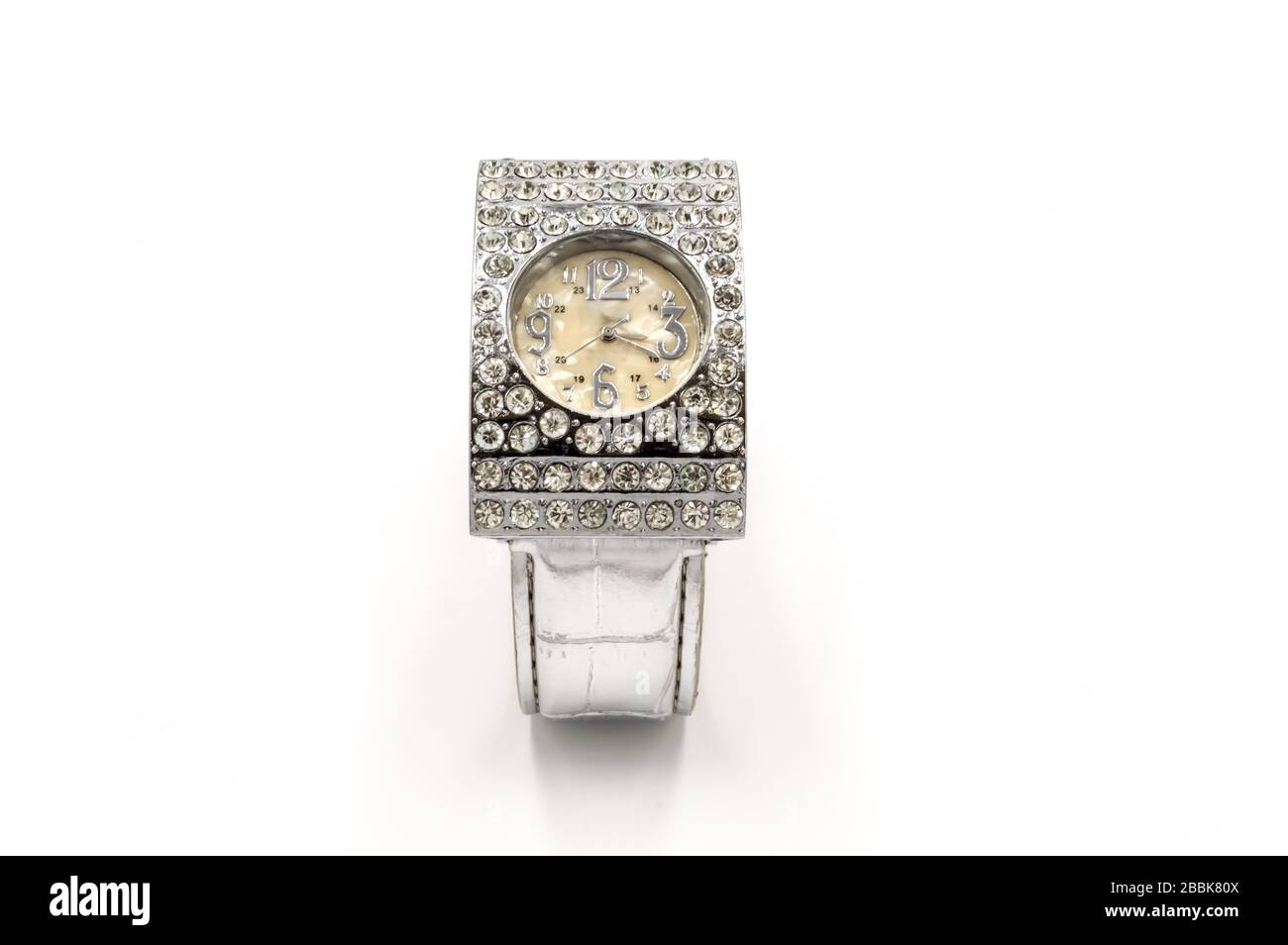 Silver quartz watch with precious stones on a white background Stock ...