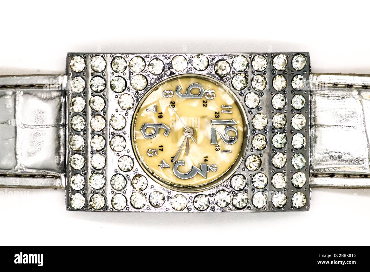 Silver quartz watch with precious stones on a white background Stock ...