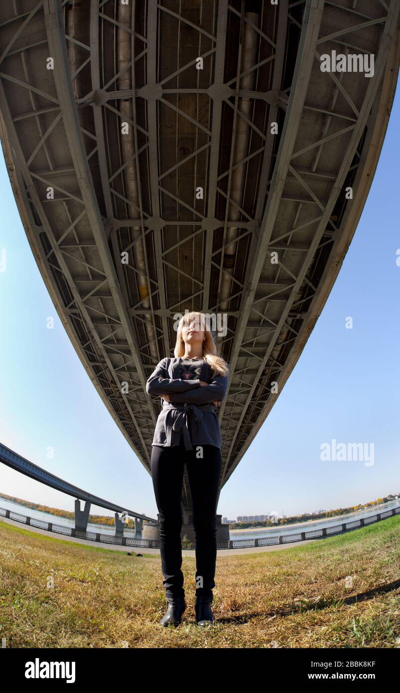 Girl under bridge hi-res stock photography and images - Alamy