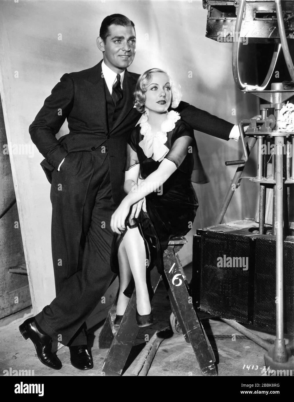 CLARK GABLE and CAROLE LOMBARD on set candid during filming of NO MAN ...