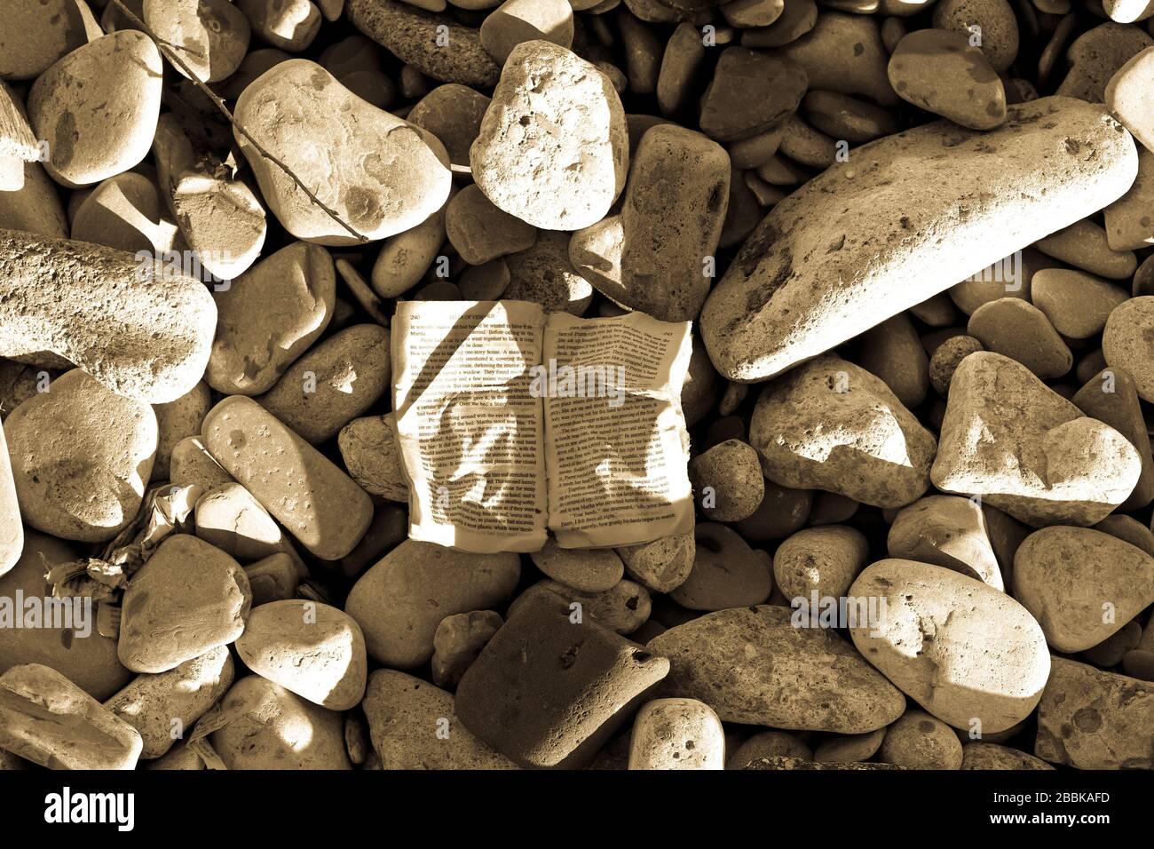 granite science - old book on stones background Stock Photo - Alamy