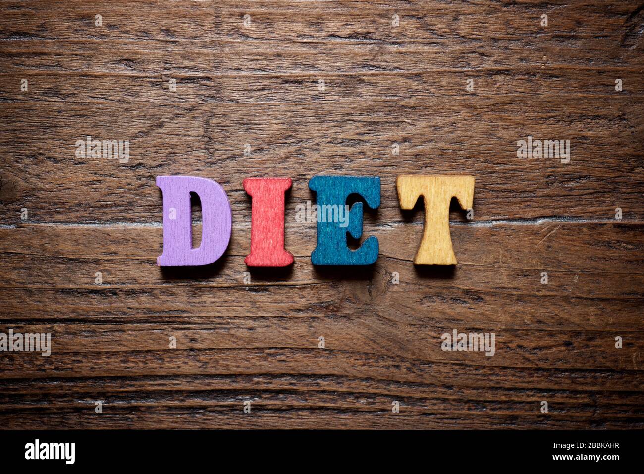Diet word on a wood table Stock Photo - Alamy