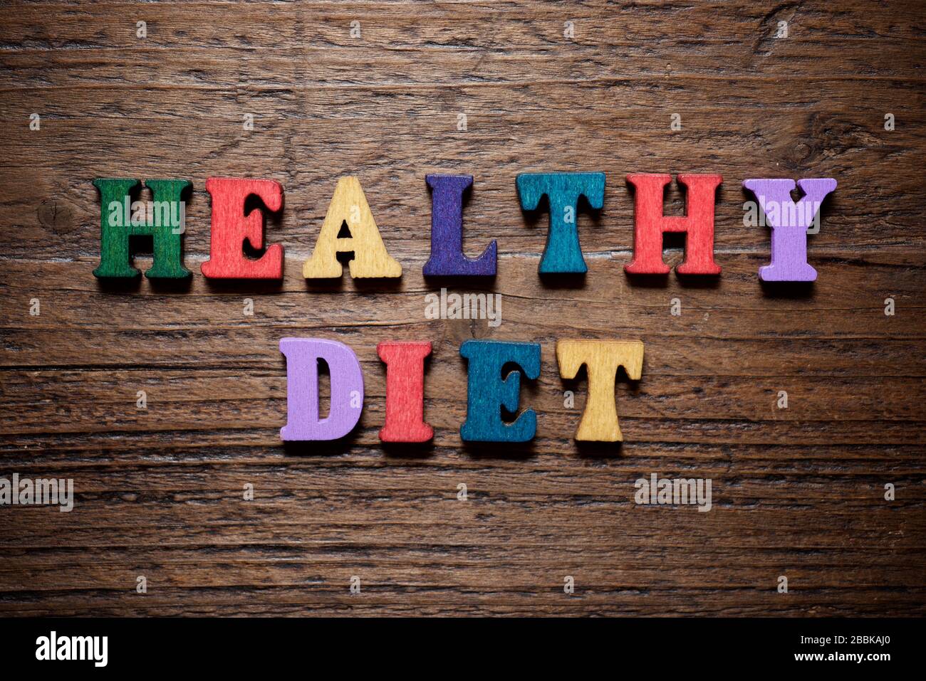 Healthy diet sentence on a wood table Stock Photo - Alamy