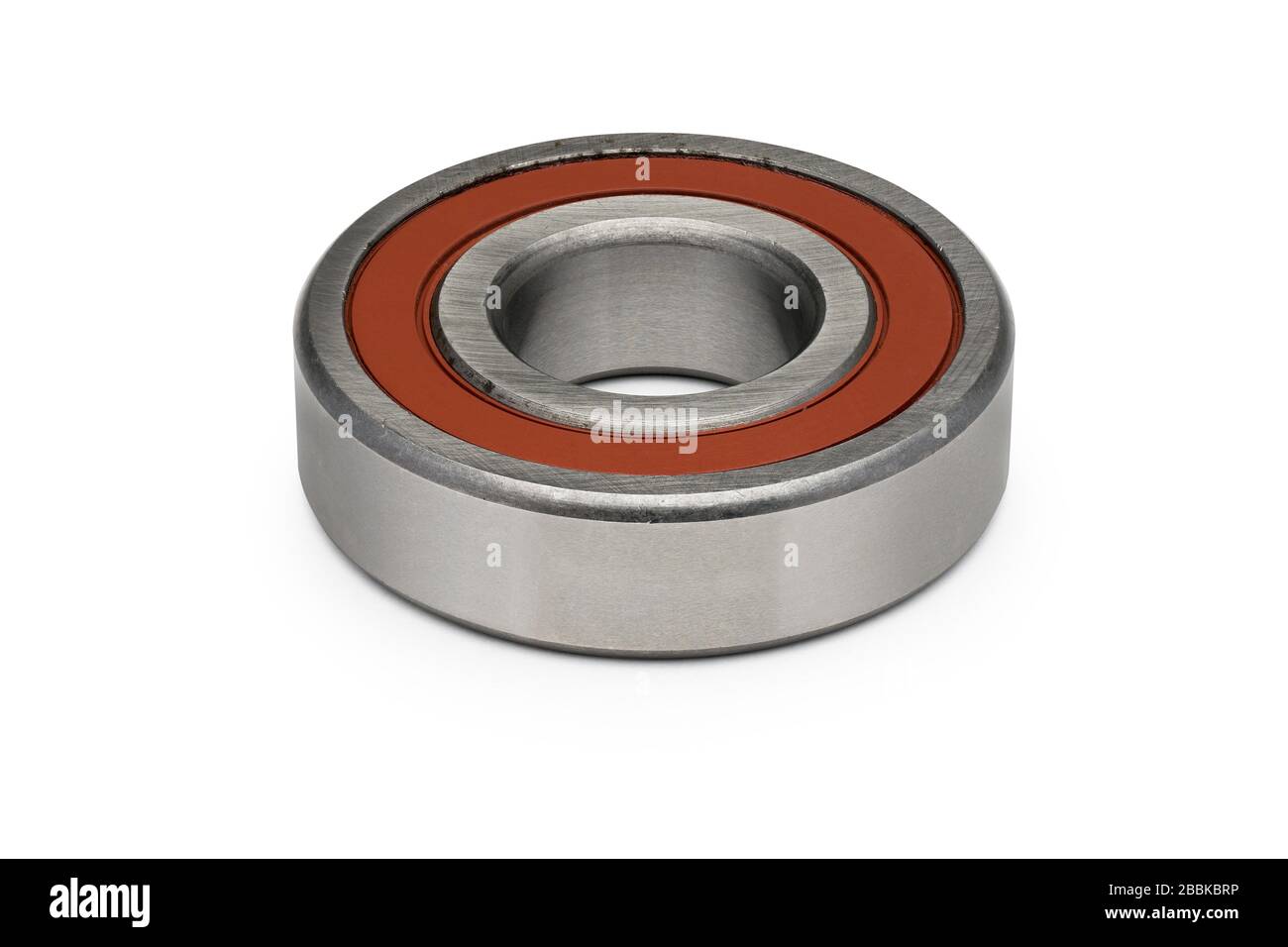 Isolate. Metal ball bearing with a red ring. Close-up. White background ...