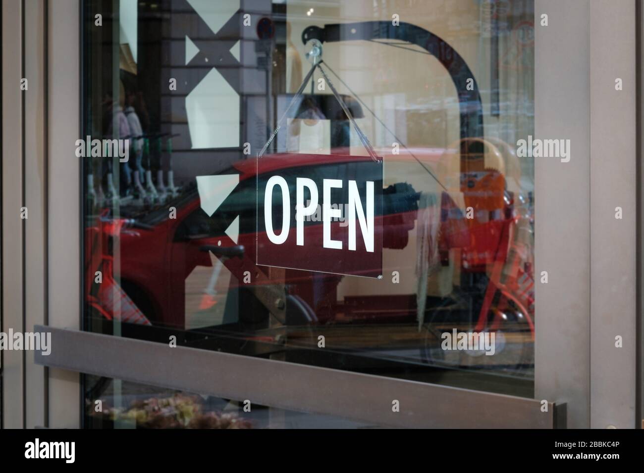 we are open sign on shop door - store window with open sign Stock Photo ...