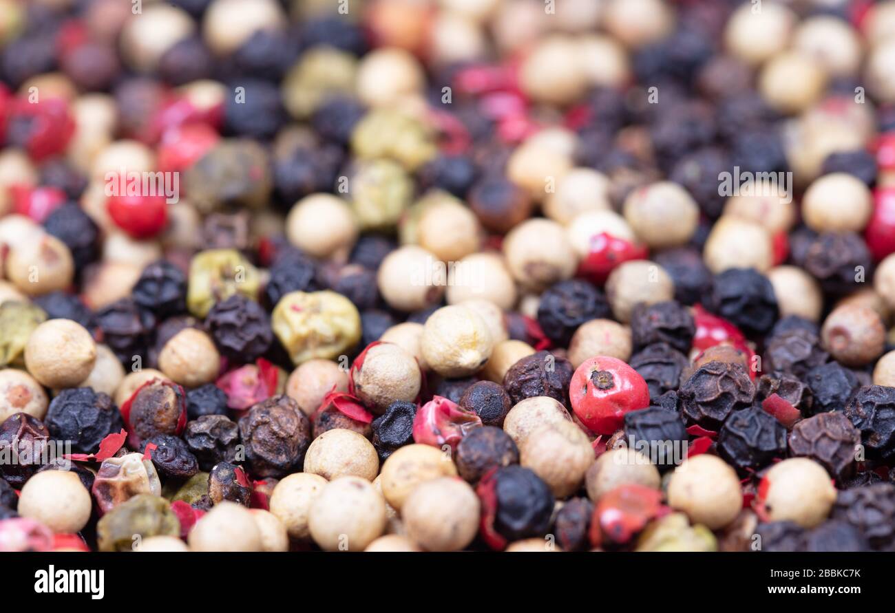 Peper background, white, green, black and red peper Stock Photo - Alamy