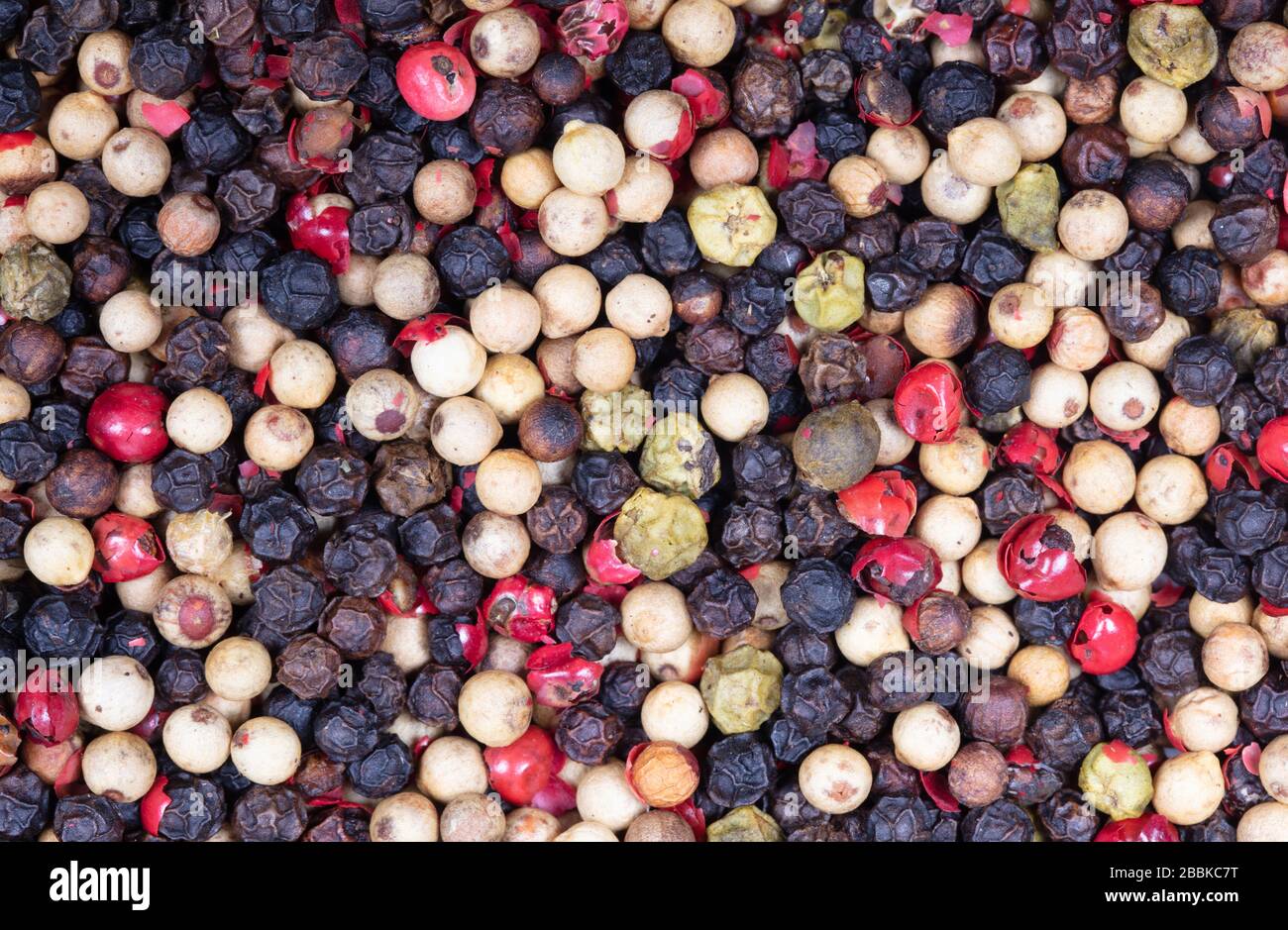 Peper background, white, green, black and red peper Stock Photo - Alamy