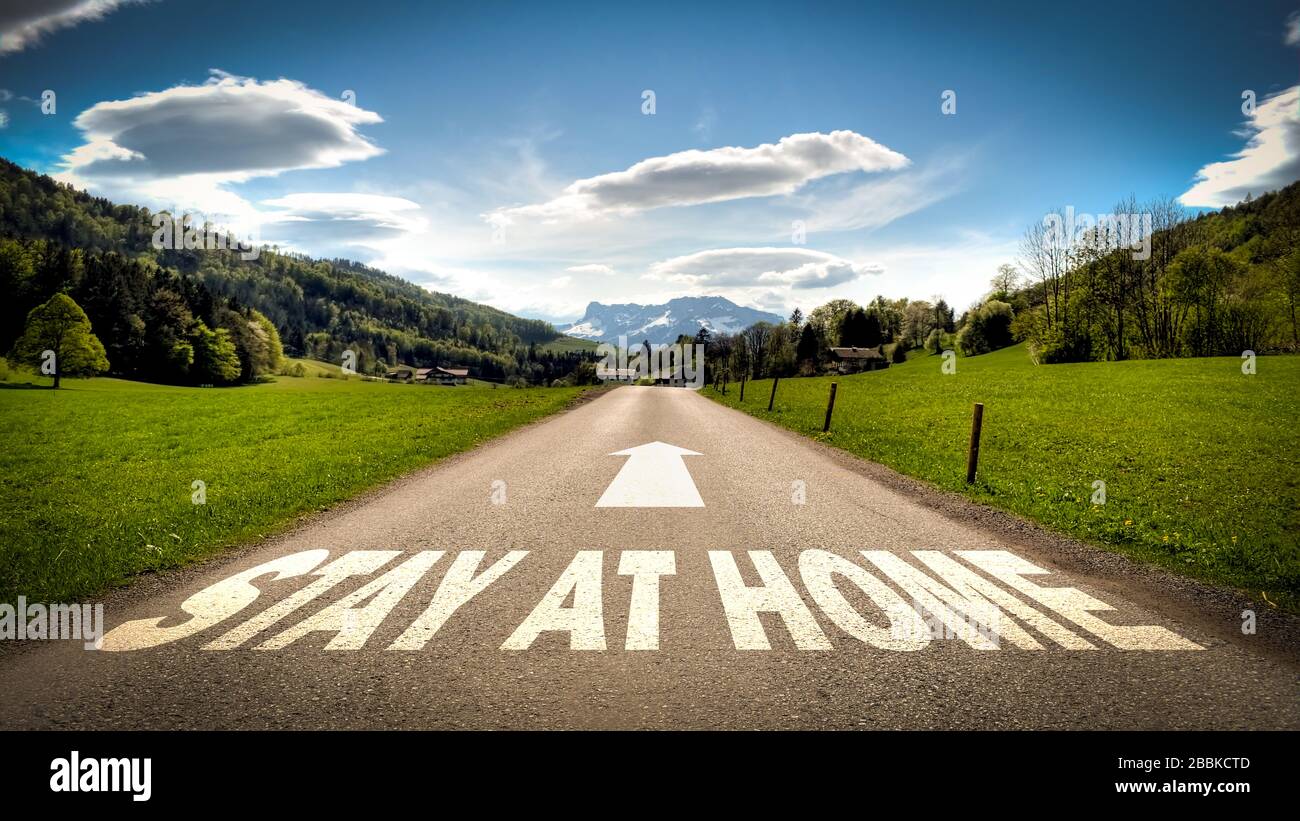 Street Sign the Way to STAY AT HOME Stock Photo - Alamy