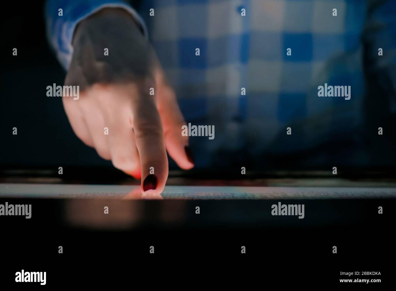 Woman using multimedia touchscreen display of interactive kiosk Stock ...