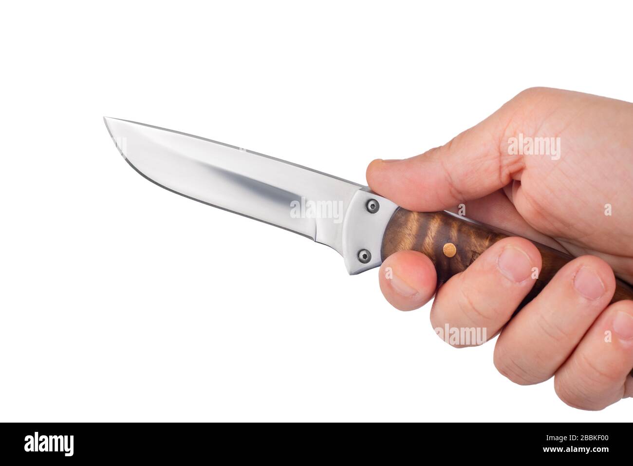 hunting knife in a hand isolated on white background Stock Photo - Alamy