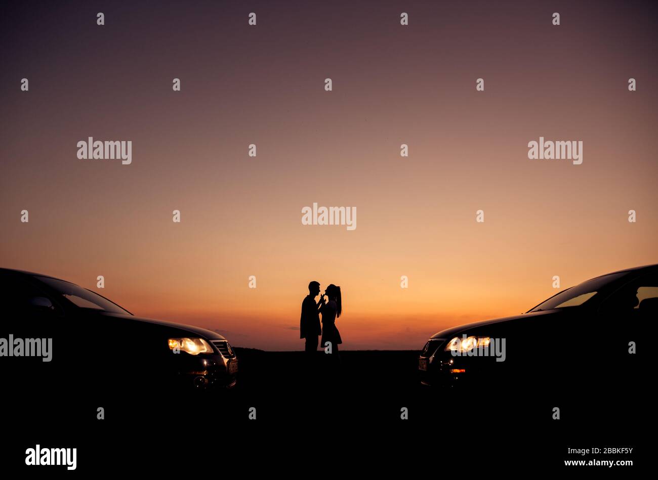 Loving couple enjoying full of love during lovely summer sunset with ...