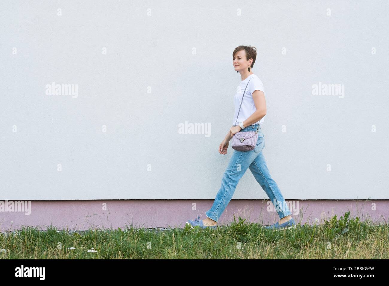 Outdoor full body portrait of young beautiful fashionable woman Stock ...